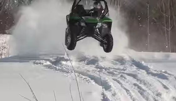 VIDEO: Arctic Cat Wildcat 1000 Jump in the Snow | UTV Driver