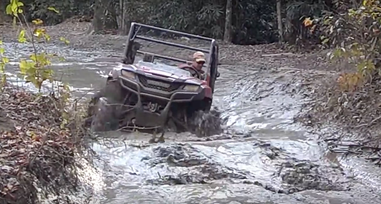 Video: Honda Pioneer mud riding | UTV Driver