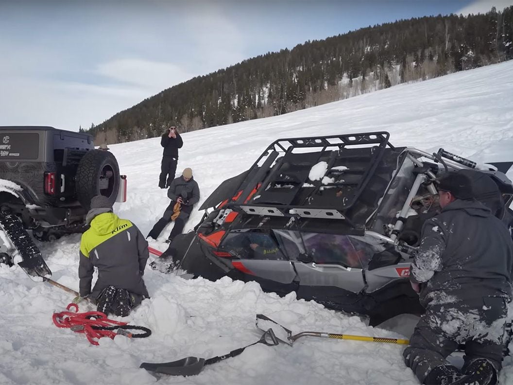 Watch HeavyDSparks Rescue a Can-Am Buried in the Snow | UTV Driver