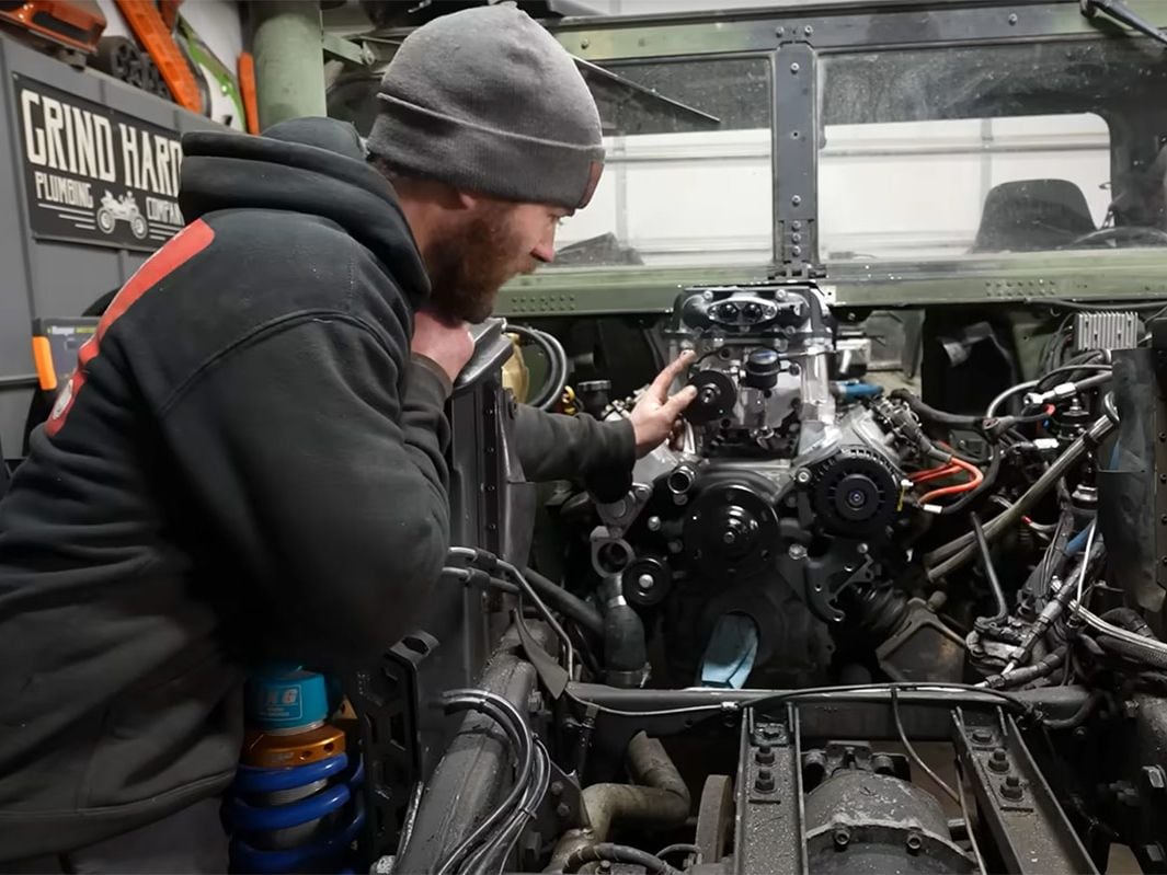 Watch Grind Hard Plumbing Put a Supercharger on a Humvee | UTV Driver