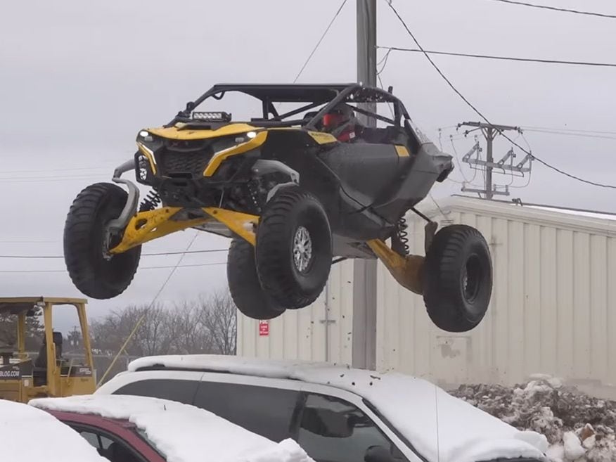 Watch SXSBlog Jump Cars in a Stock Can-Am Maverick R | UTV Driver